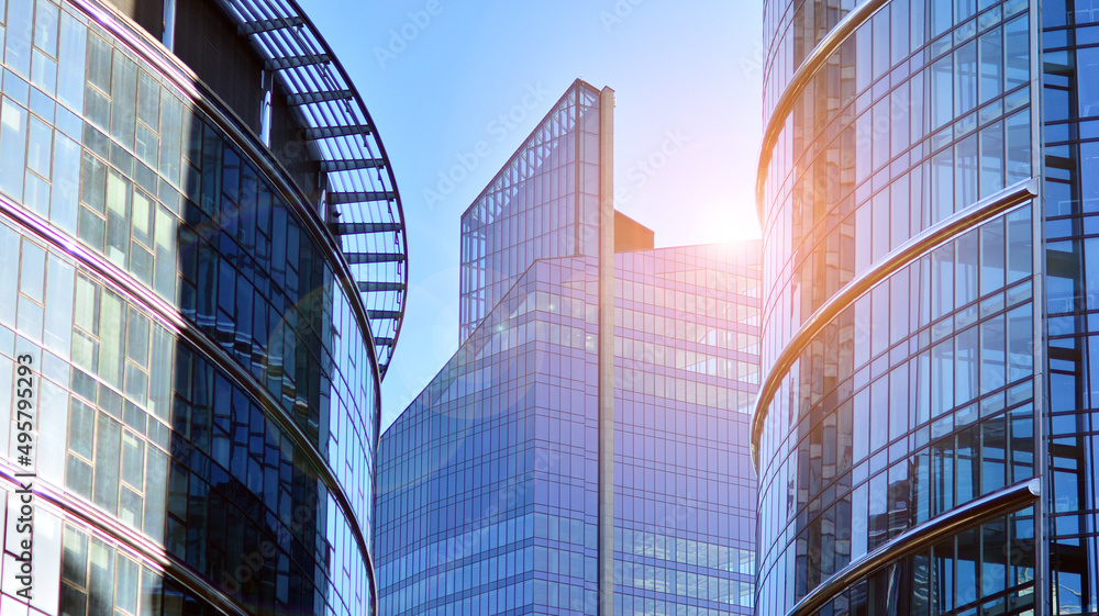 Glass building with transparent facade of the building and blue sky ...