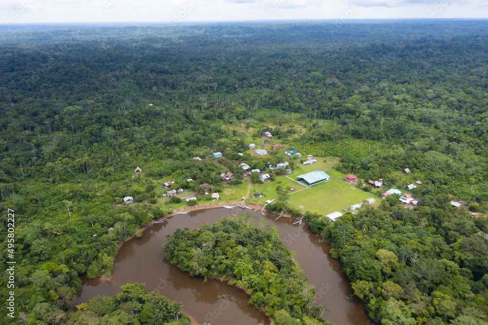 Aerial view over an indigenous community in the Amazon rainforest Stock ...