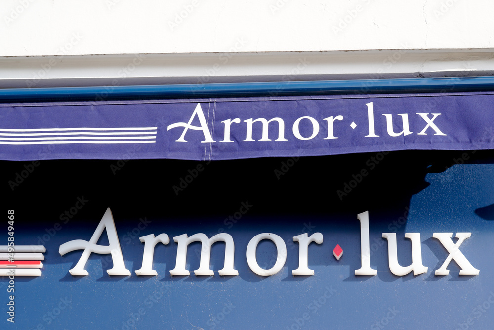 Armor Lux brand logo and sign facade text French clothing store marine ...