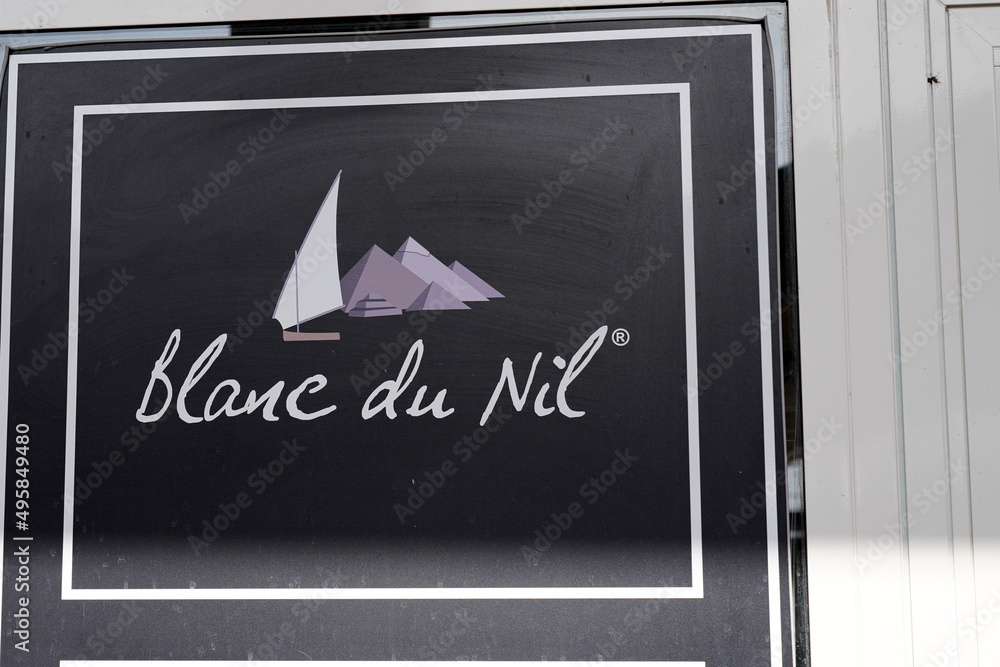 Blanc du nil logo brand and text sign facade wall of store French chain ...