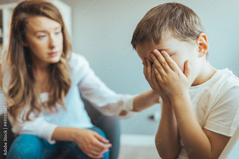 Children need help. Upset little boy crying in psychologist's office ...