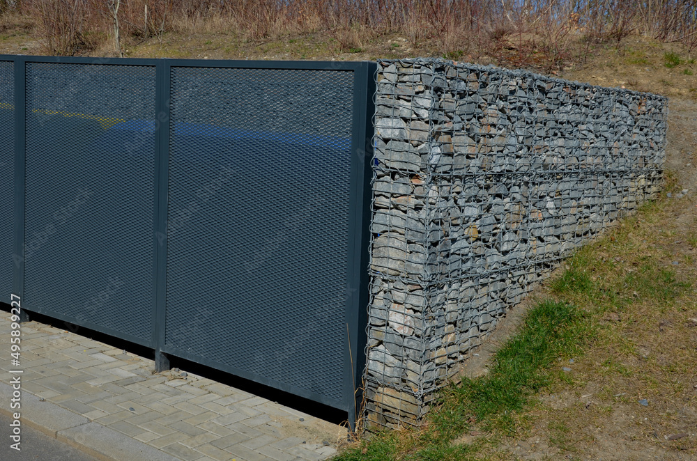 gabion yard for placing containers for sorting household waste. gray ...