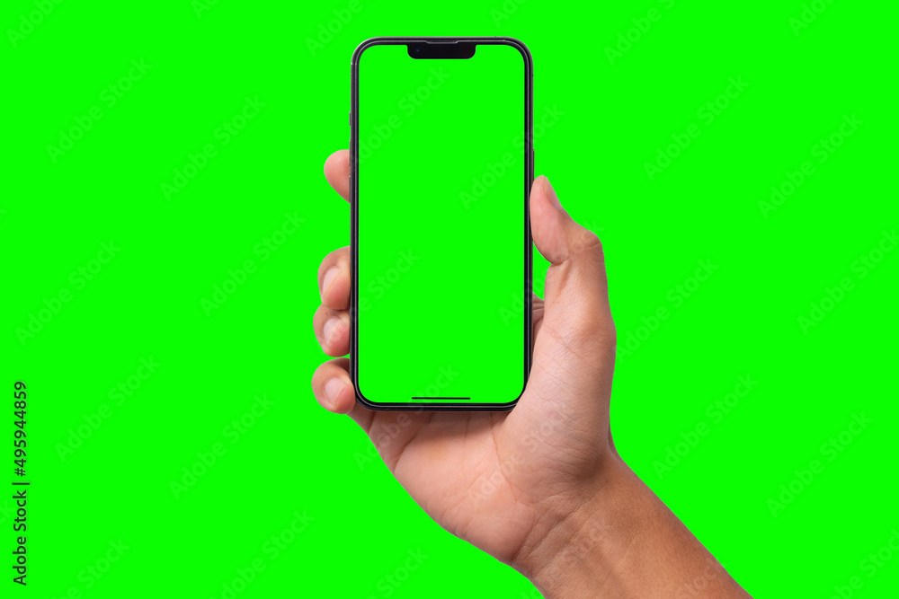 Hand holding smartphone set with green screen for VDO editer and modern ...