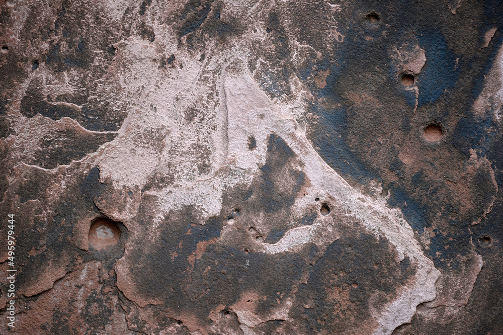 World war II bullet holes in the front side of an old crypt on a ...
