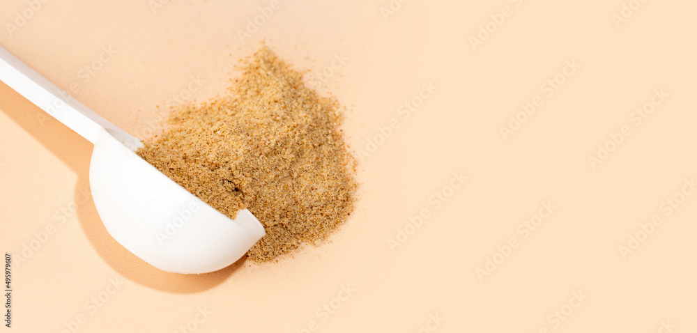 Mixture of biologically active additives. White scoop of dietary fiber ...