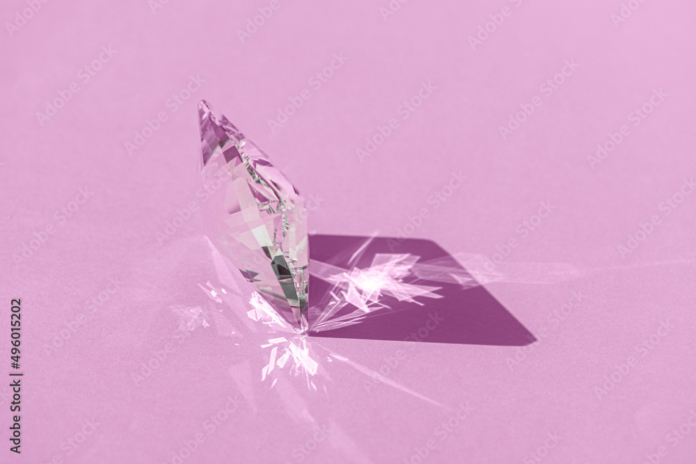 Crystal prism with light diffraction of spectrum colours and reflection ...