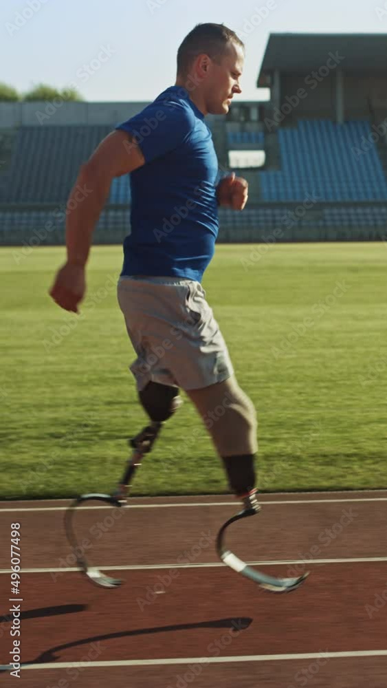 Athletic Disabled Fit Man with Prosthetic Running Blades is Training on ...
