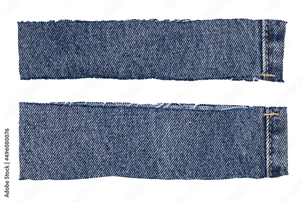 Closeup of two cut-off pant leg pieces of a blue denim jeans isolated ...
