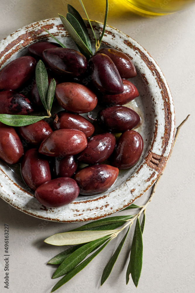 Kalamata olive, Aceitunas Kalamon and grissini breadsticks, olive oil ...