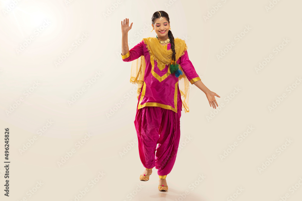 Sikh Woman performing bhangra during Baisakhi Celebration Stock Photo ...