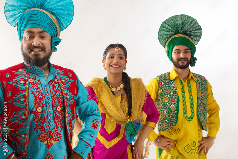 Sikh people performing bhangra together during Baisakhi celebration ...