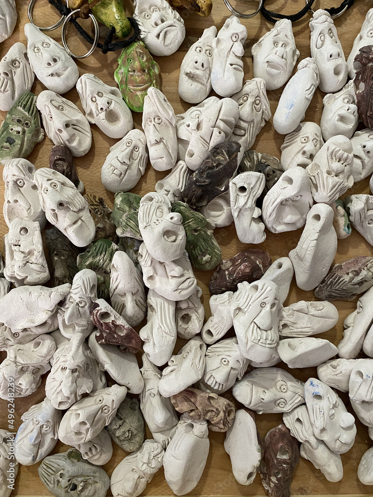 The table with face masks chaotically arranged. There are different ...