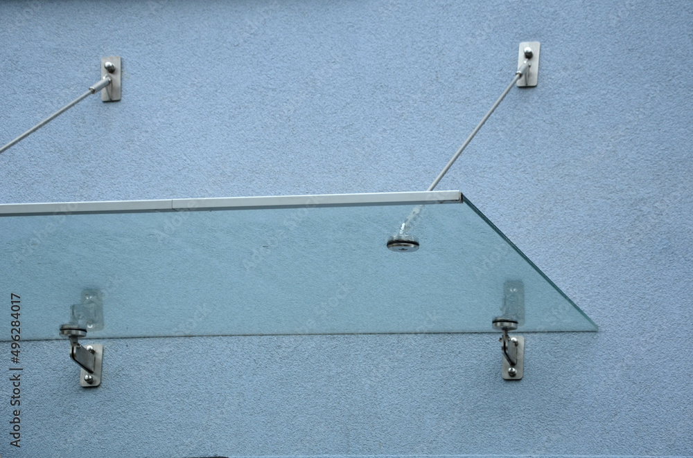 Glass roof above the entrance to the industrial building with metal ...