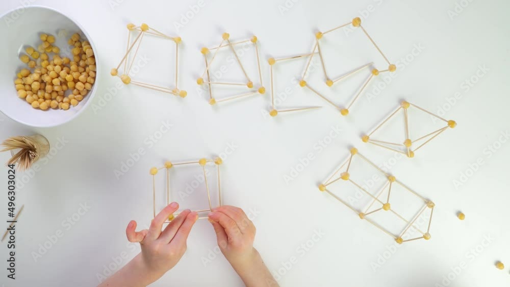 Chickpea Constructor Top View Children Hands Play On White Background chickpea-constructor-top-view-children-hands-play-on-white-background