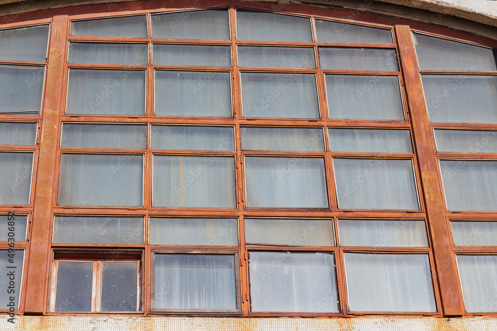 Texture of an old dirty factory windows with a lantern, industrial ...
