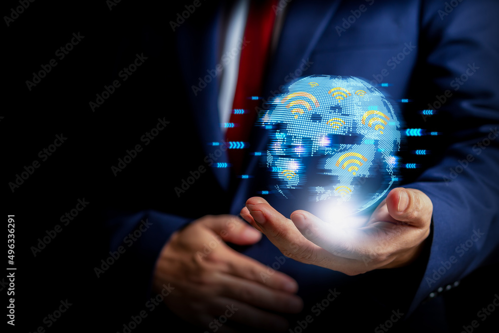 man holding the illustration of the world in hand media technology ...