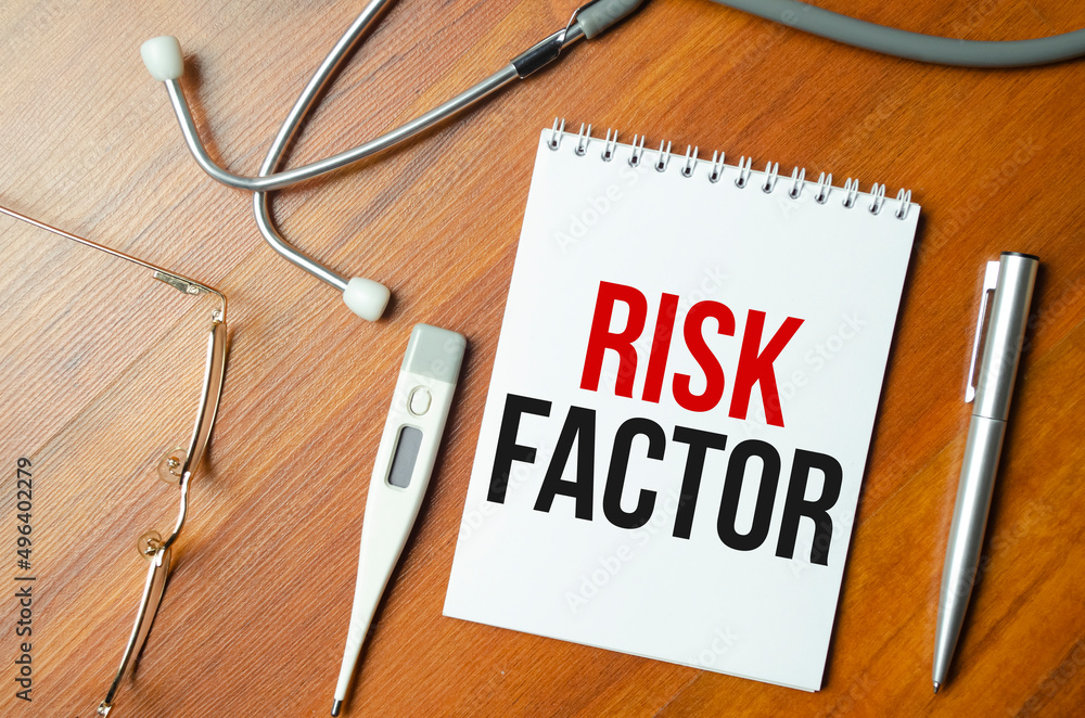Risk factor text on paper with heart beat diagram, stethoscope, Stock ...