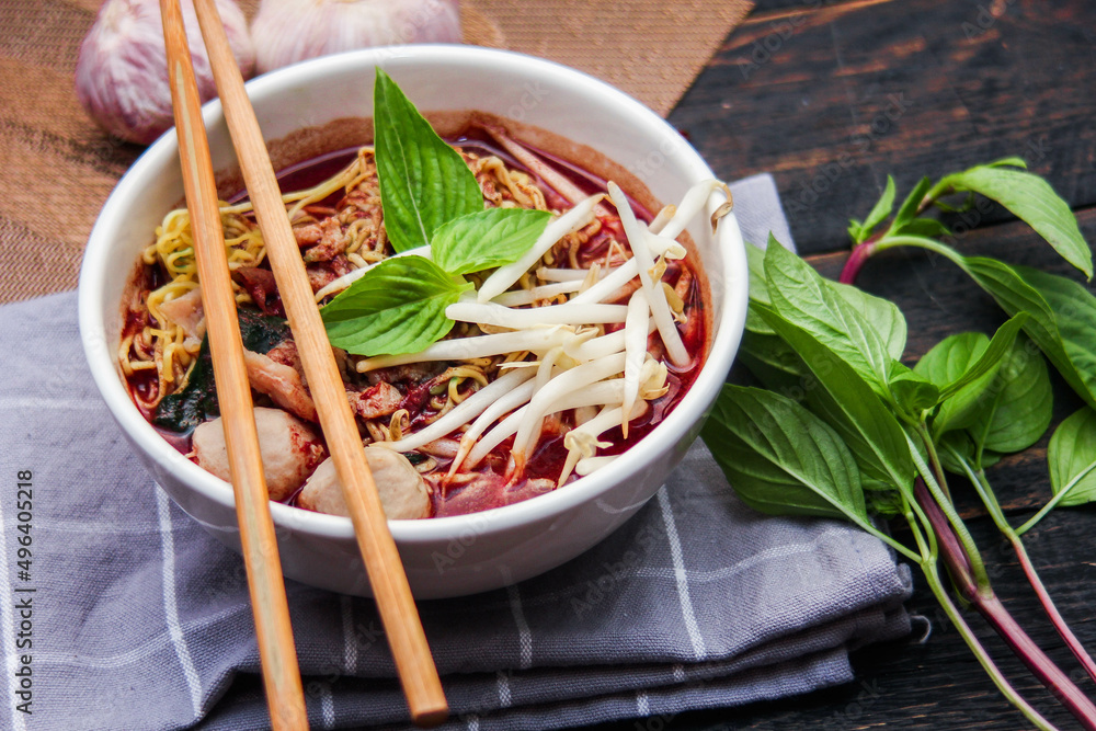 Thai noodle with pork is a street food that is commonly sold in ...