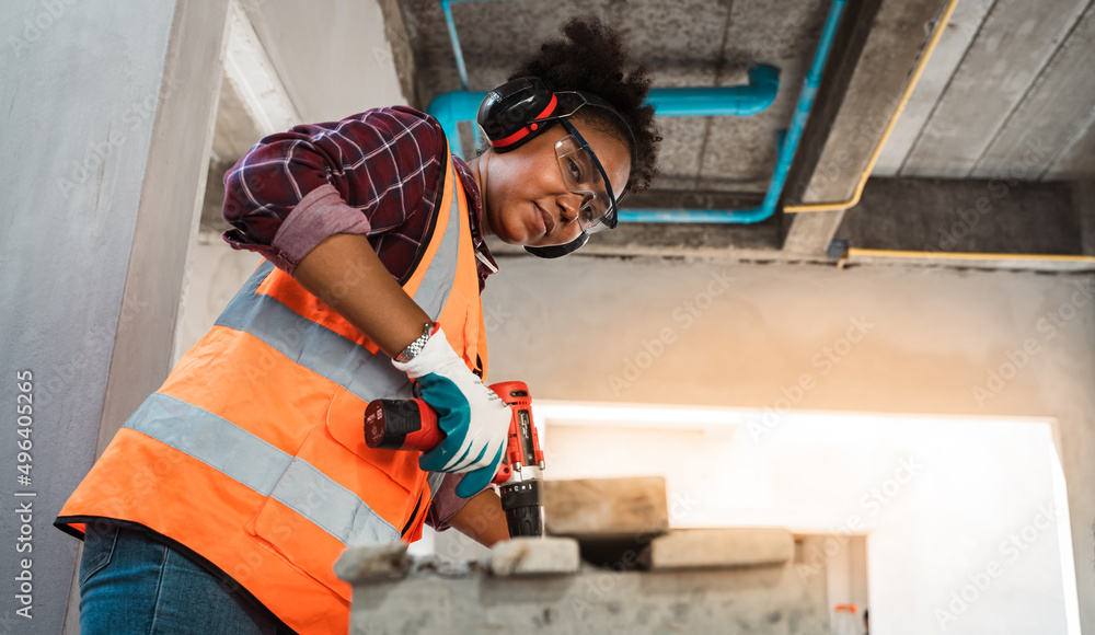 Cute looking female engineer with afro hairstyle. African descent ...