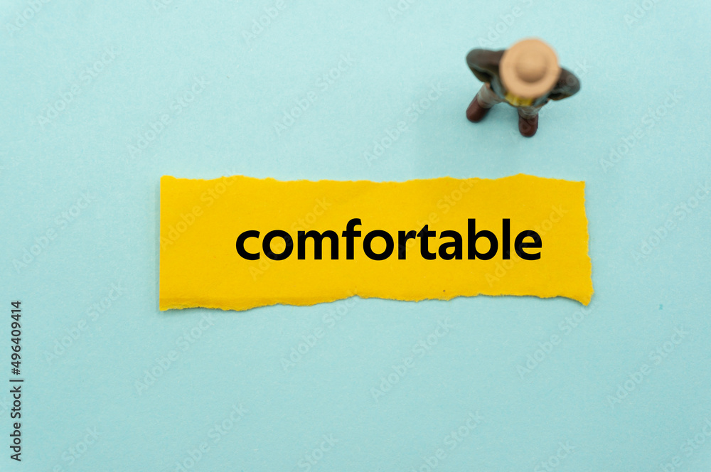 comfortable.The word is written on a slip of paper. Emotional nouns ...