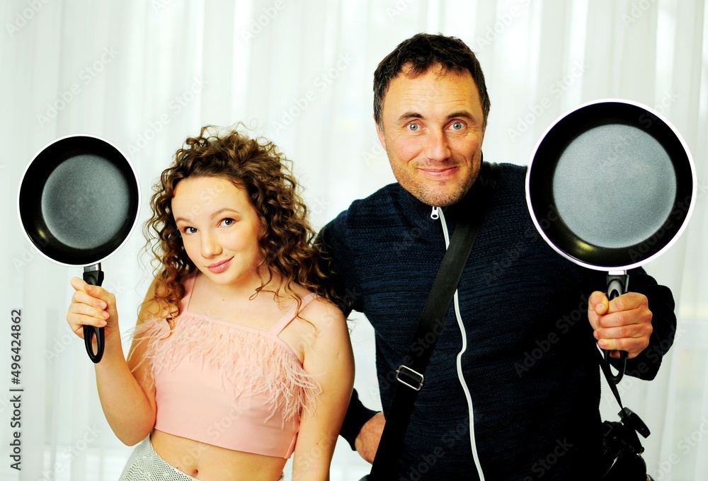 girl and father fool around standing different surprised faces have fun ...