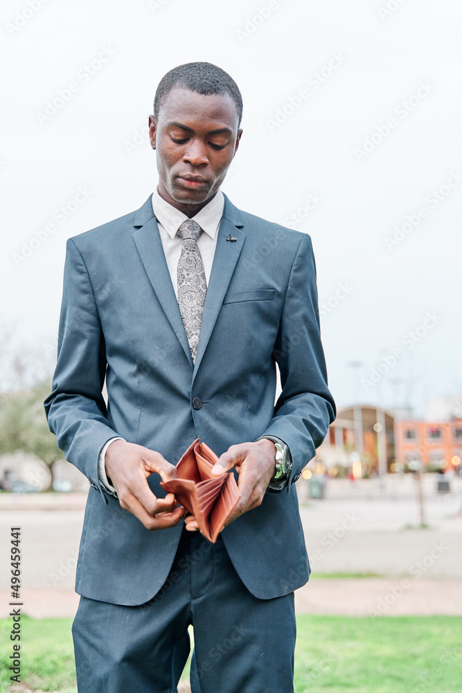 african american man in suit and tie showing empty wallet Stock Photo ...