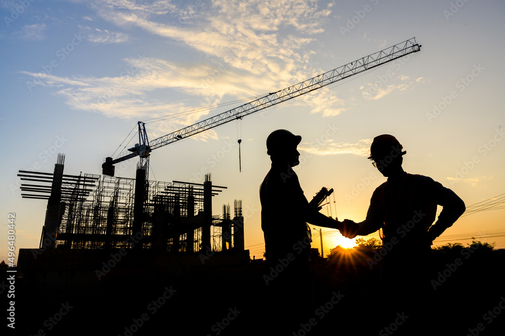 silhouettes of construction engineers or managers and construction ...
