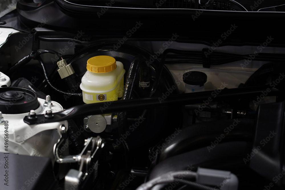 Brake fluid tank inside the Modern car engine, automotive part. Stock ...