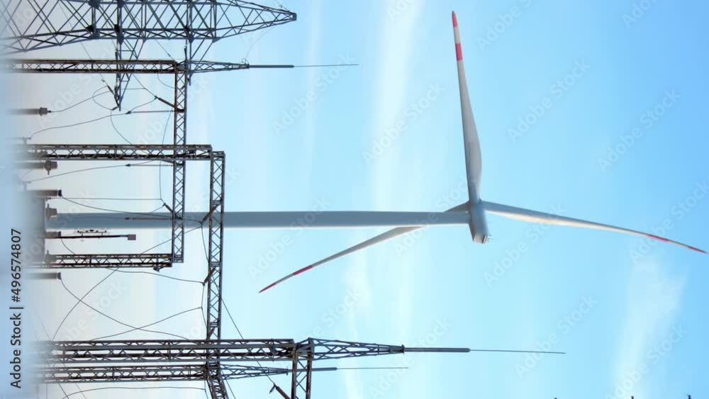 Wind turbine and electric power transmission at station. Powerful ...