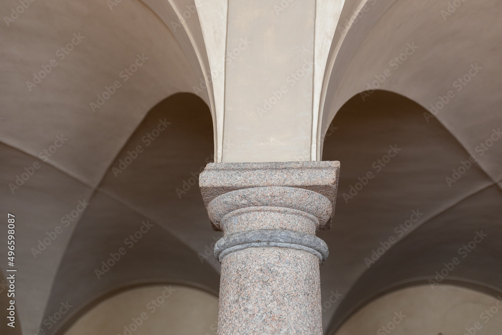 arch with columns in an old historical building of European ...