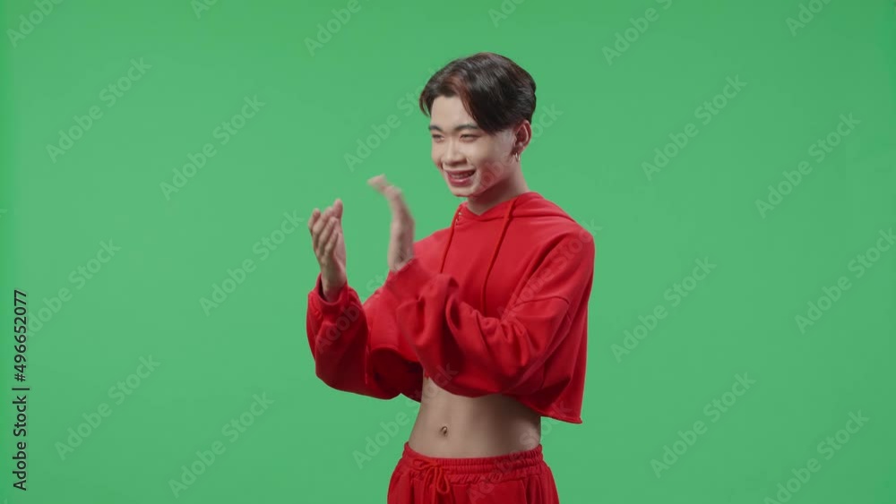 Side View Of Young Asian Transgender Male Clapping Her Hands In The ...