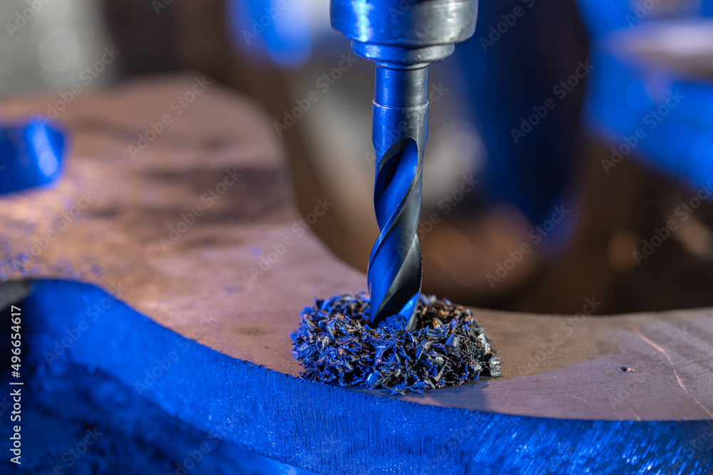 metal drill bit make holes in aluminum billet on industrial drilling ...
