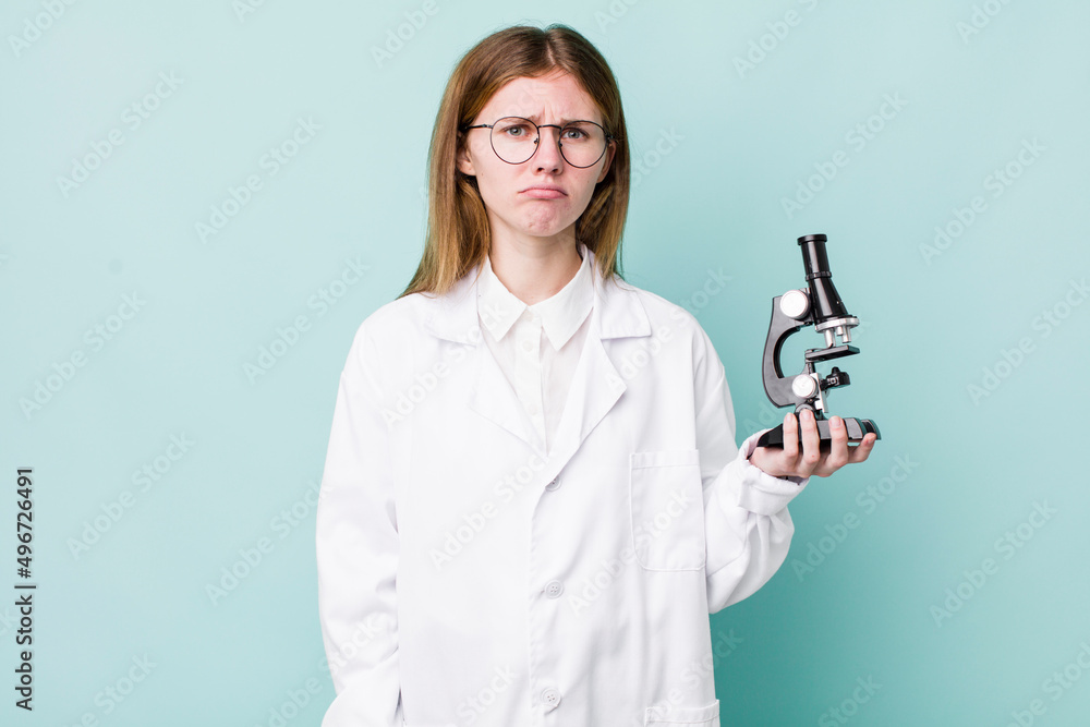 red head pretty woman feeling sad and whiney with an unhappy look and ...