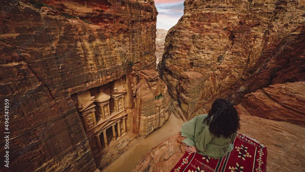 Cinemagraph seamless video loop of a young female woman in Petra Jordan ...