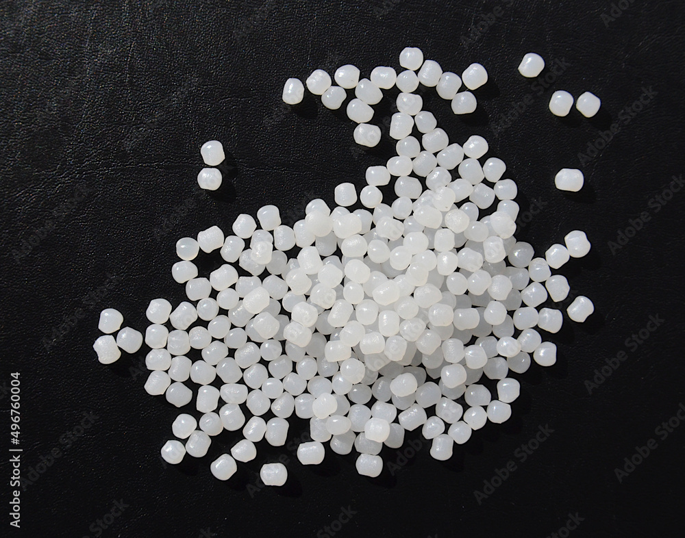 detail of polyethylene pellets used in extrusion manufacturing of ...