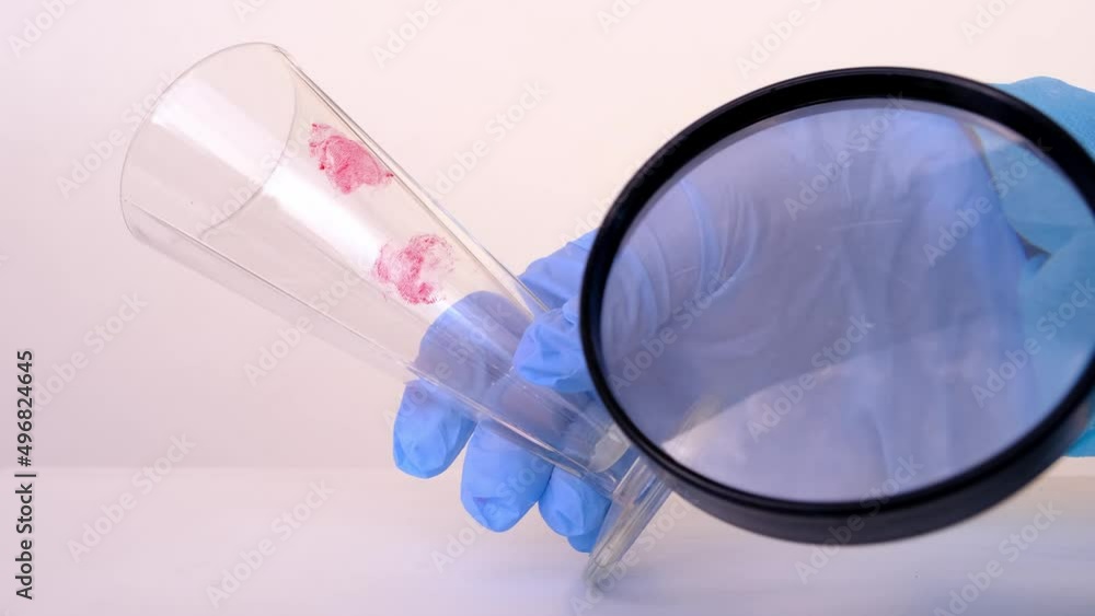 evidence idfresh splatter of red blood on glass goblet, forensic ...