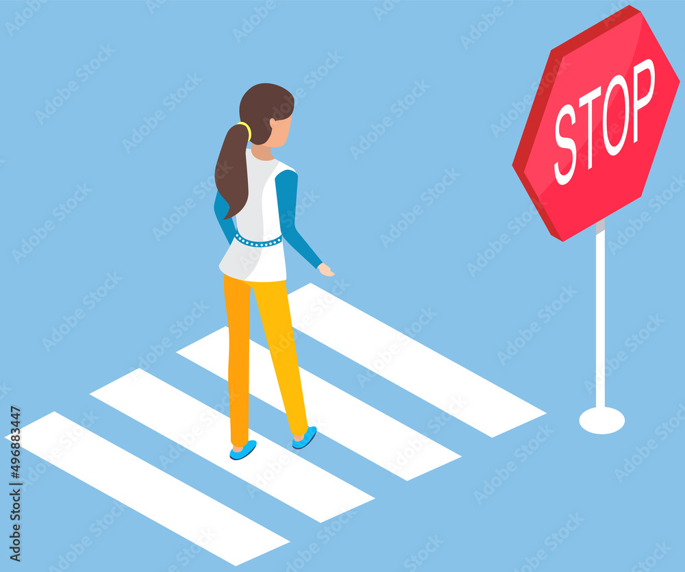 Woman crossing road near stop sign. Pedestrian walks along crosswalk ...
