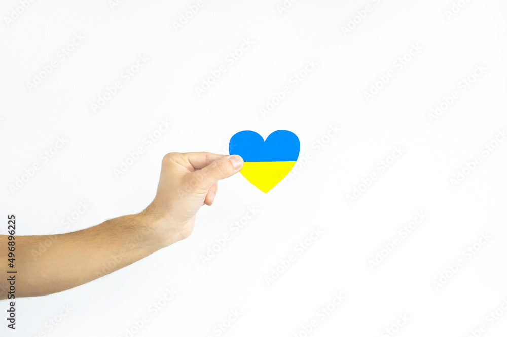 The concept of love for Ukraine. heart in the colors of the flag of ...