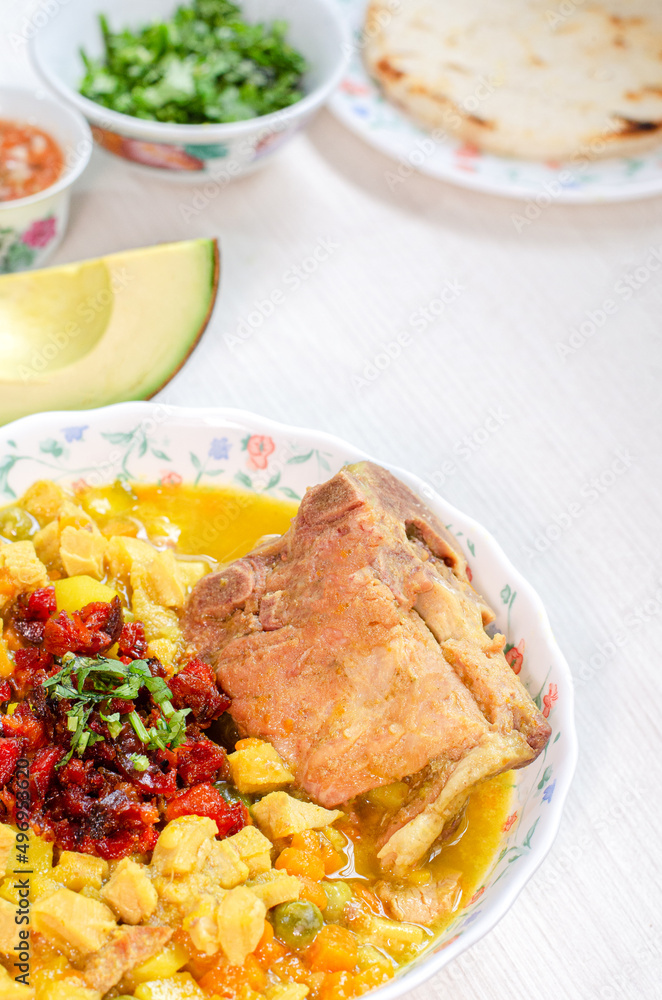 Dish soup with tripe and backbone pork, called mondongo, traditional ...