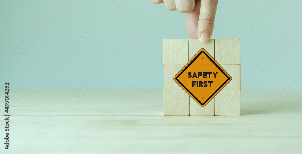 Safety first symbols, work safety, caution work hazards, danger ...