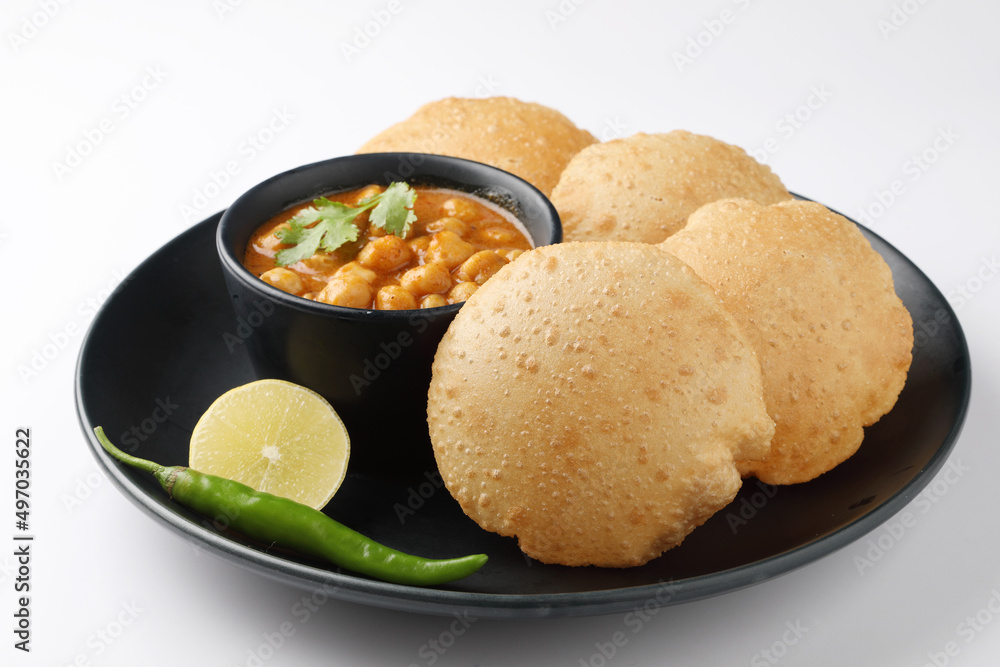 Puri and Chole traditional Indian food Indian dish spicy Chick Peas ...