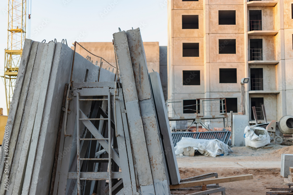 Many precast concrete wall panels are stocking in the storage area ...