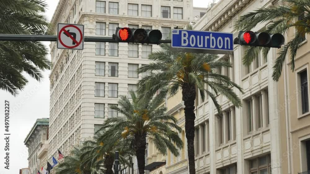 Bourbon Street Sign and Traffic Light Shaking in High Wind New Orleans ...