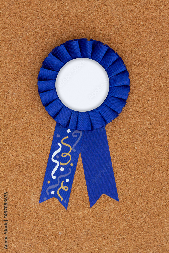 Blue ribbon on a bulletin board for your award, competition, or success ...