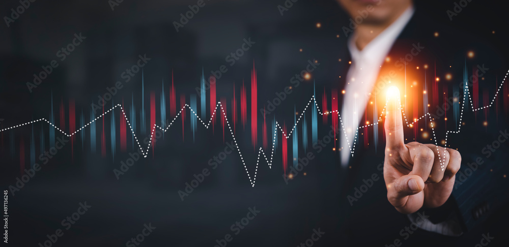 Businessman touchscreen line of Stock market or forex trading graph and ...