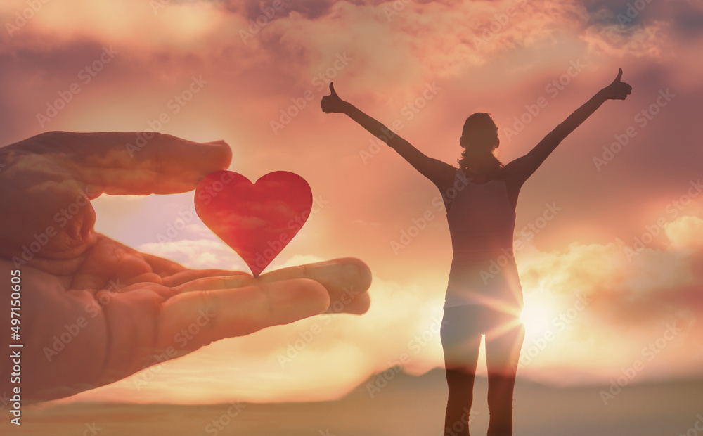 Love strength and power concept. Young happy female celebrating victory ...