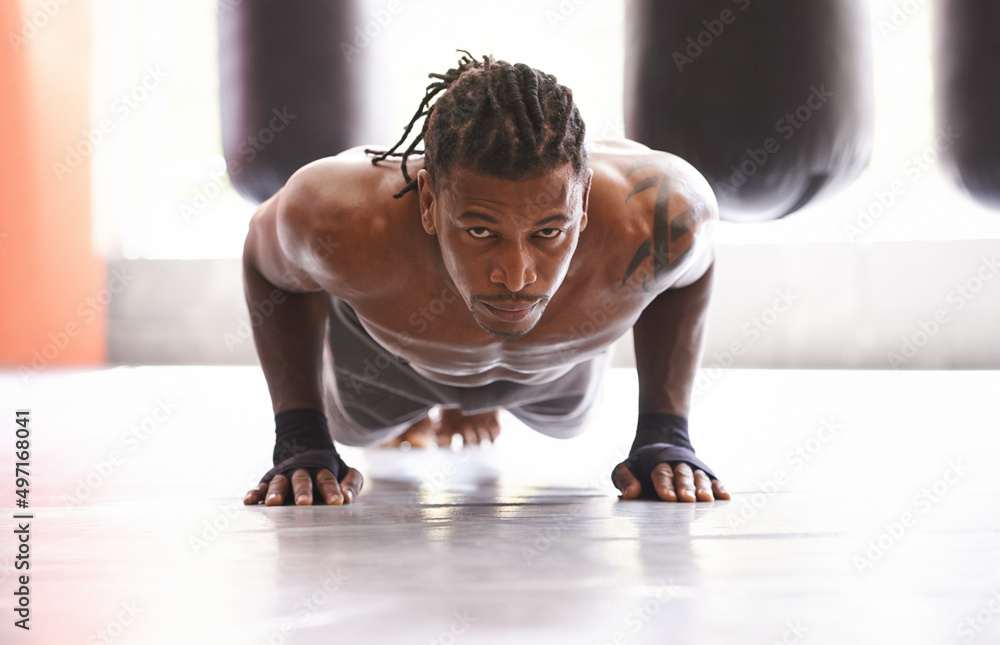 Foto de Molding his body into a fighting machine. Portrait of a young ...