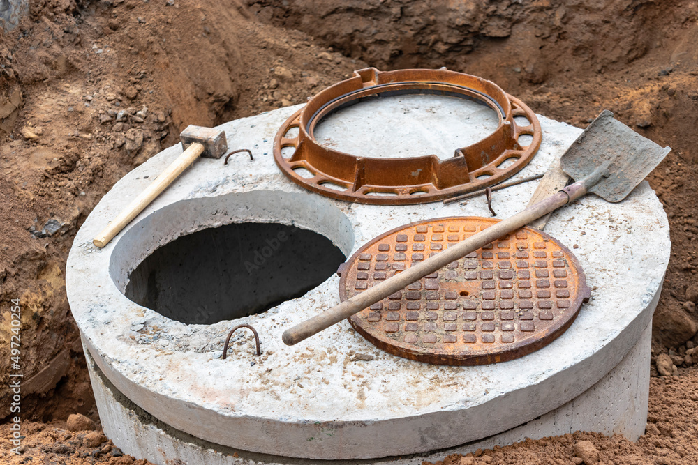 Installation of a reinforced concrete well for water supply and ...