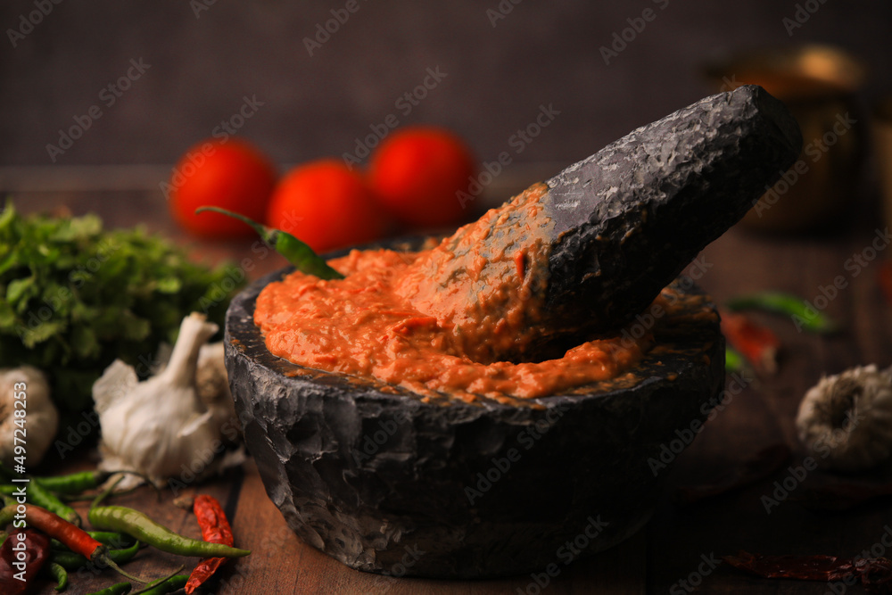chutney grinding in mortar and pestle,south indian food Stock Photo ...
