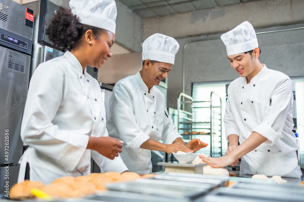 Smiling african american young female bakers looking at camera..Chefs ...